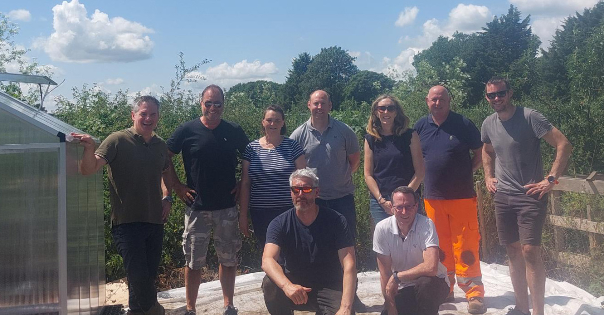 Members of VolkerFitzpatrick’s senior management team help build an ...